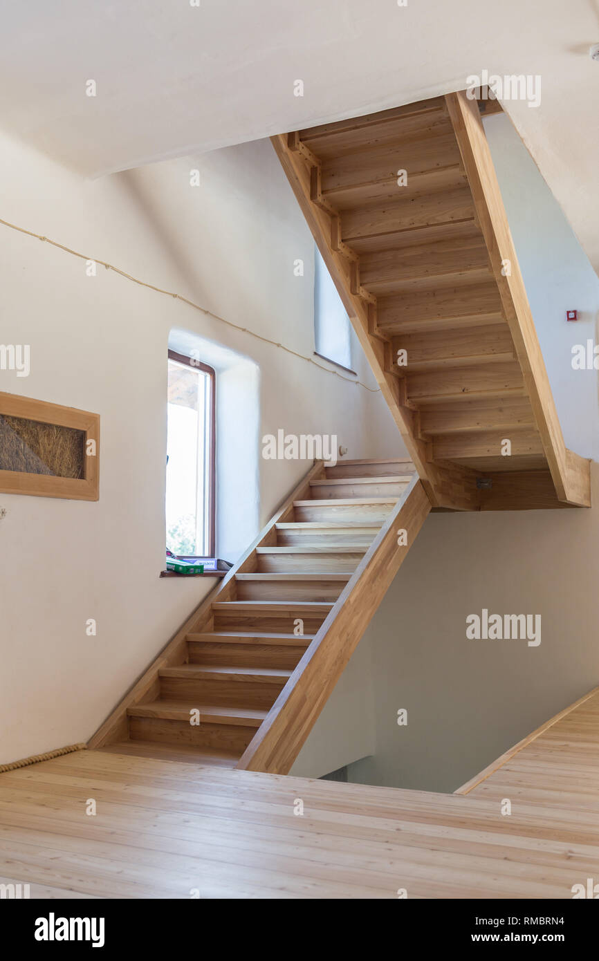 Wooden staircase without laminated timber railing Stock Photo - Alamy