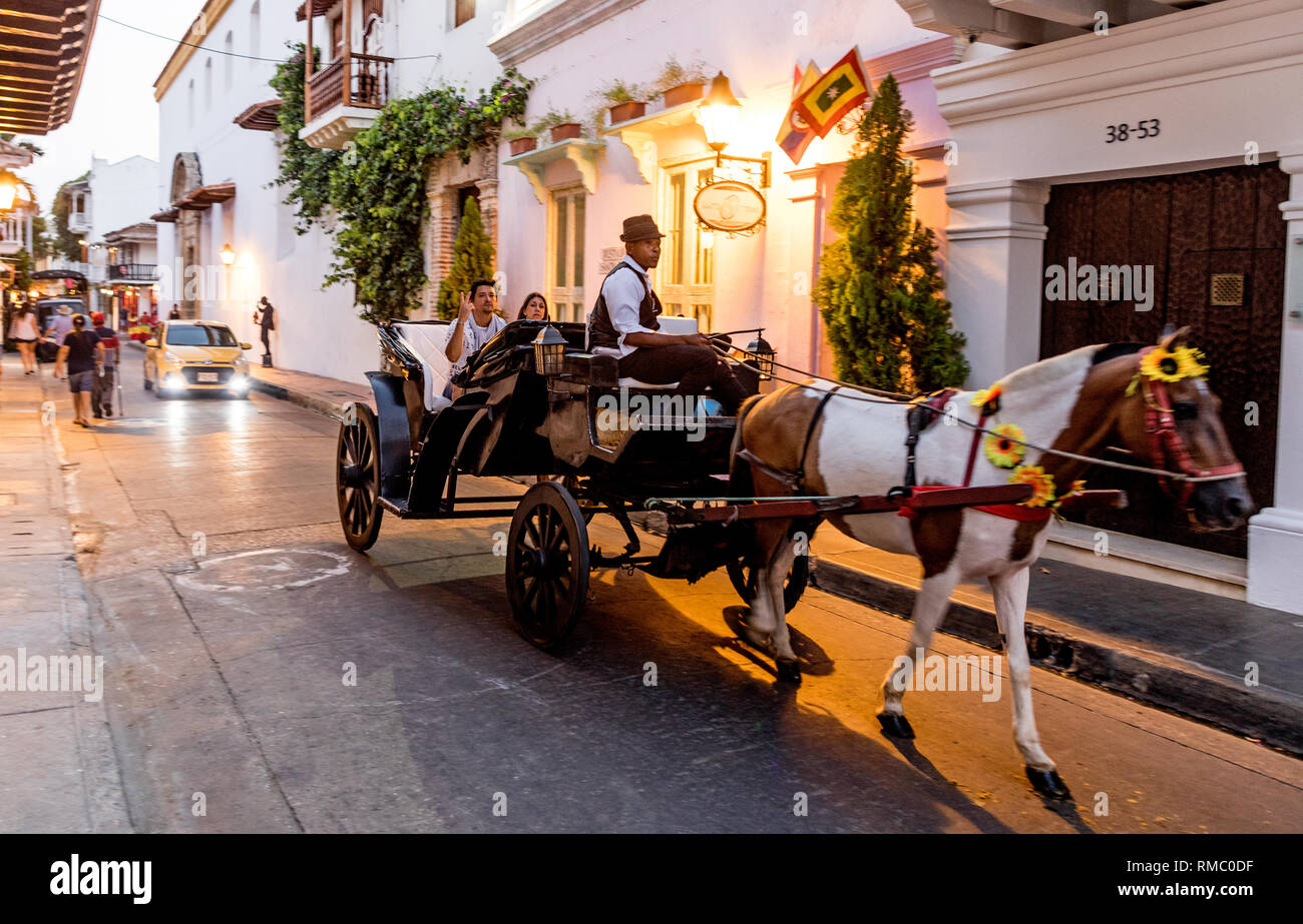 Tourists Riding in Horse Drawn Carriage At Night Cartagena Colombia ...