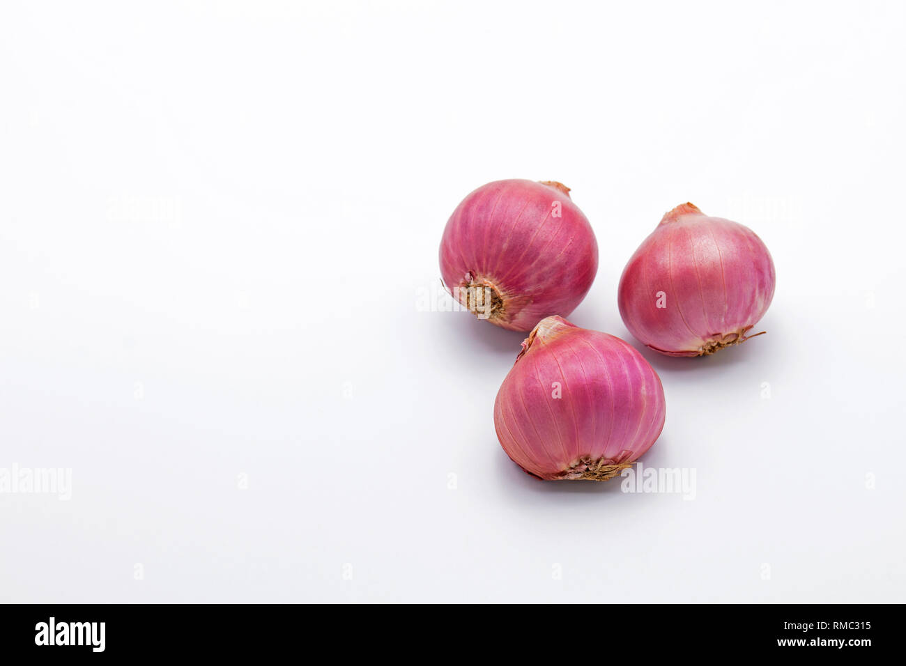 Three Red Onions Isolated on White Background Stock Photo - Alamy