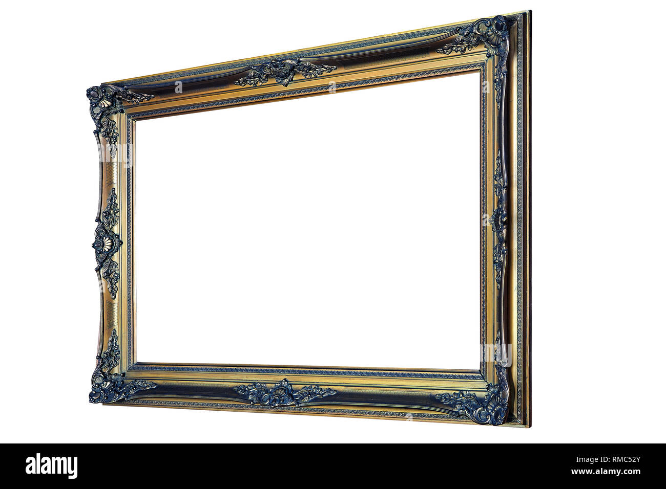 Ornamental wooden gold frame hanged on wood wall. Perspective view and ...