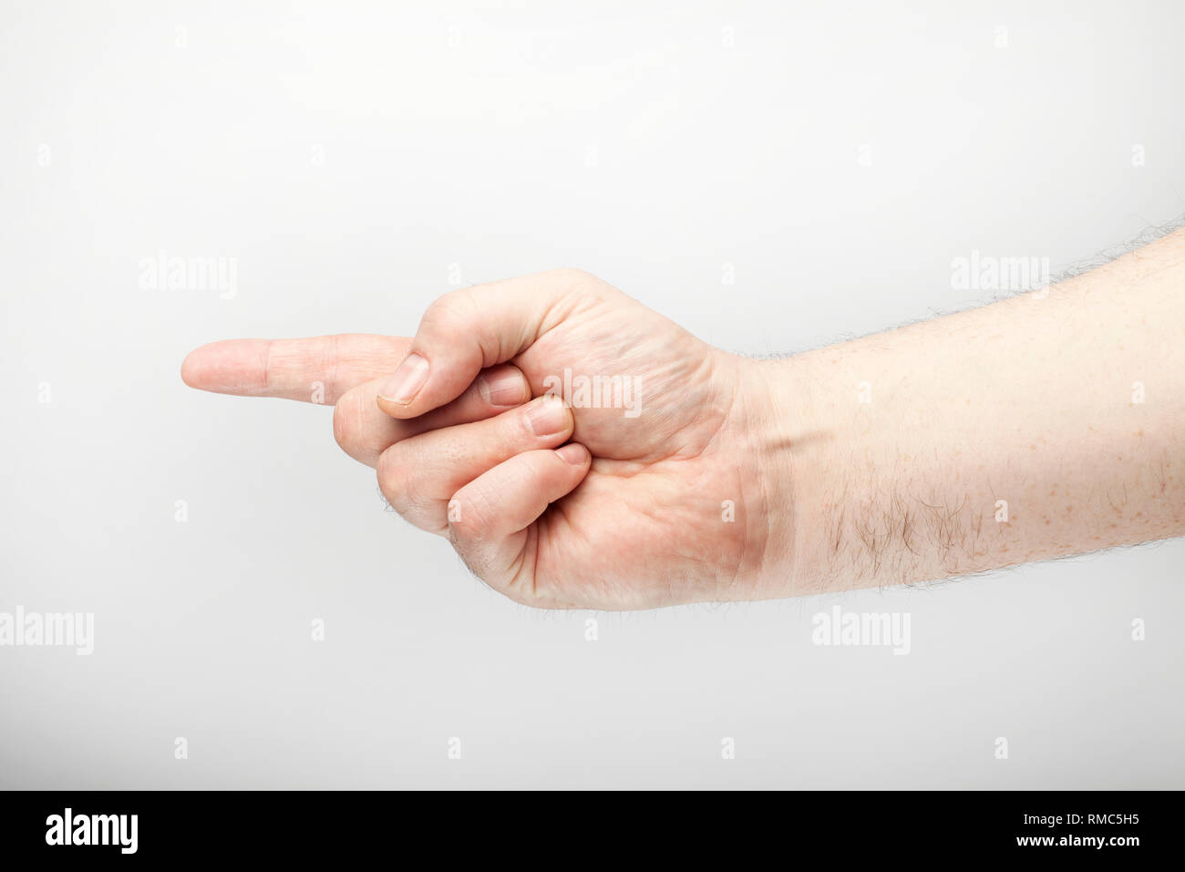 Male hand pointing with the index finger, isolated on the white ...