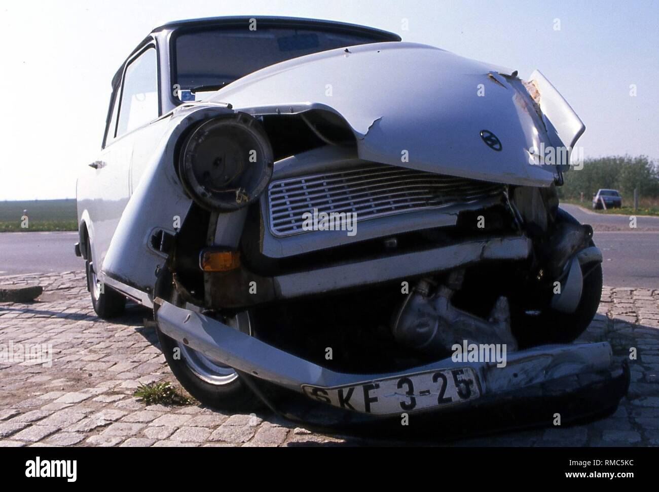 A totalled Trabant on the roadside after an accident Stock Photo - Alamy