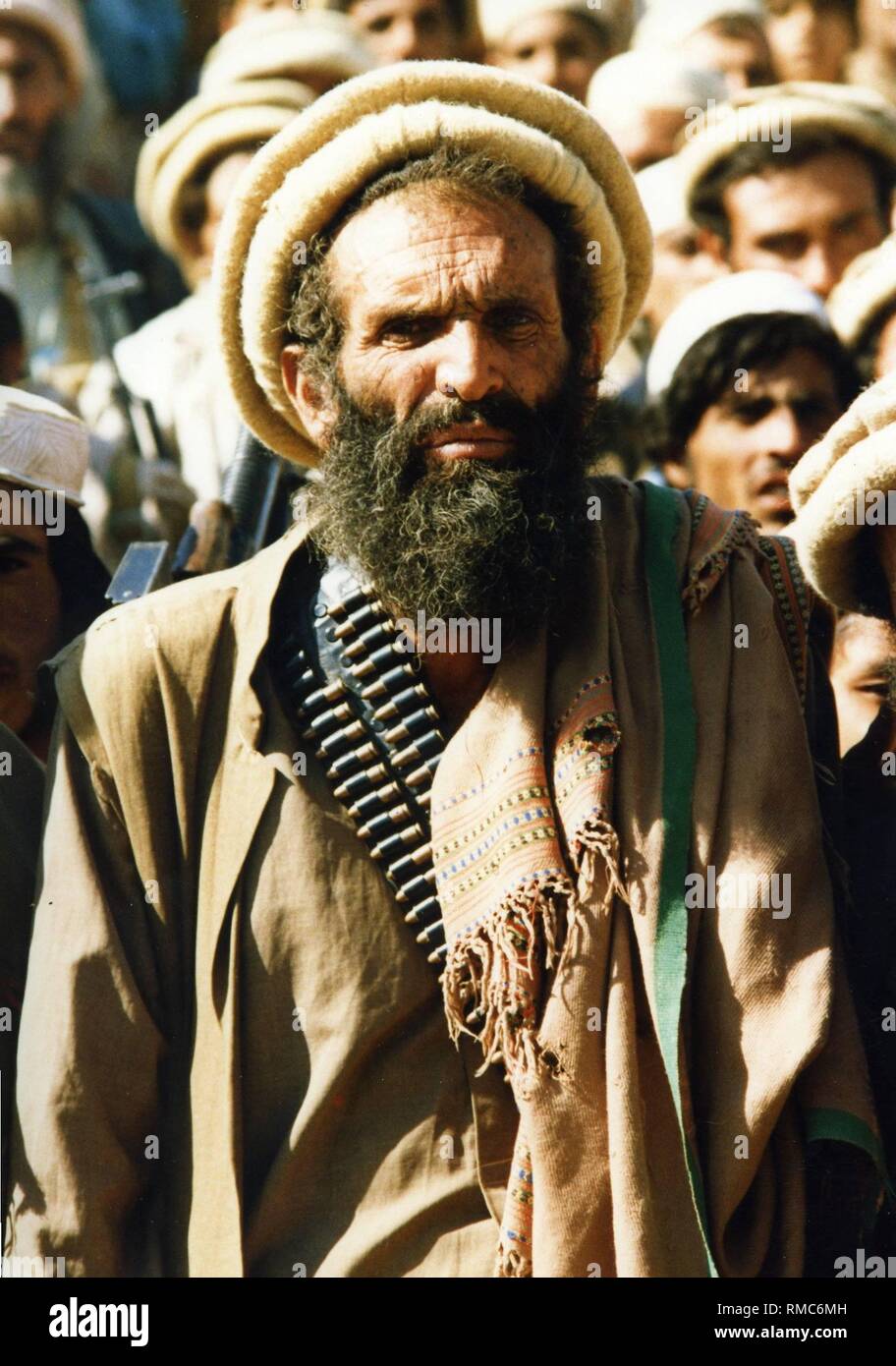Afghan fighters in a camp on Pakistani territory. The mujahedeen cross ...