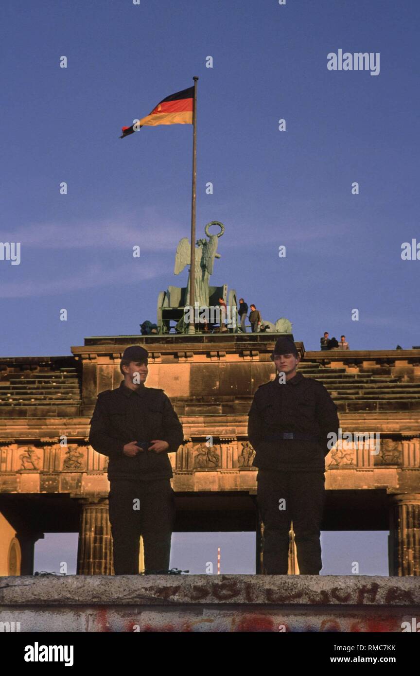 Berlin, November 10, 1989: GDR border guards on the Wall at the ...