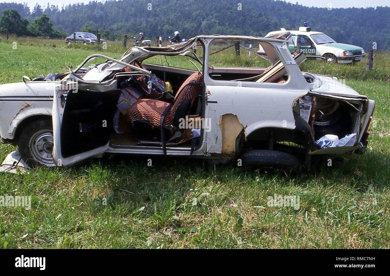 A totalled white Trabant after an accident in a field near Herleshausen ...
