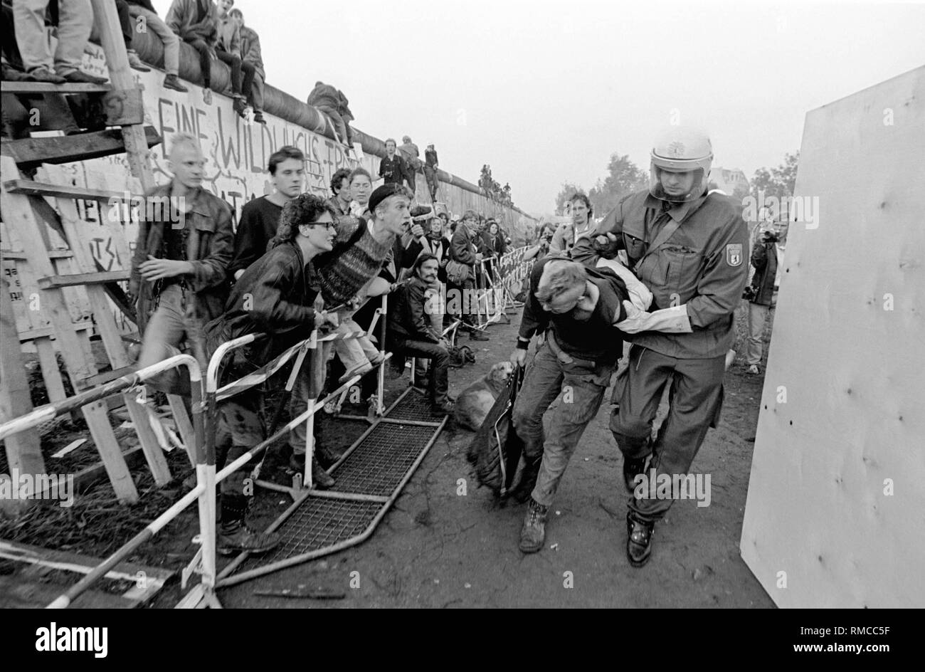 Police arrest squatter Black and White Stock Photos & Images - Alamy