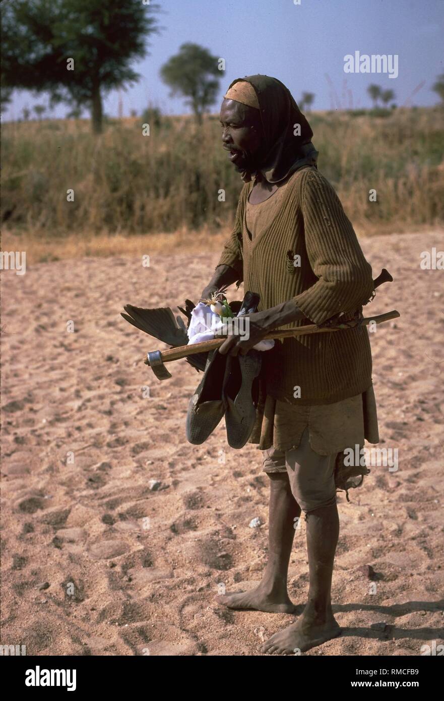 Beggar with his few belongings on the Dinder River Stock Photo - Alamy