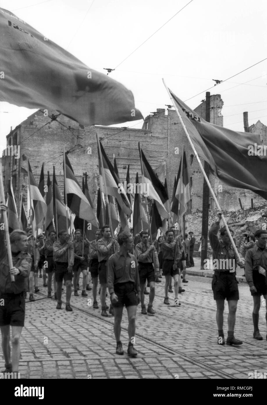 FDJ rally through the city of East Berlin, which was destroyed by the ...