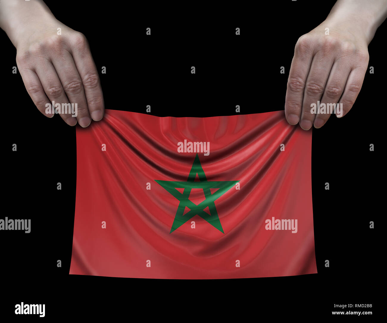 Morocco flag in hand hi-res stock photography and images - Alamy