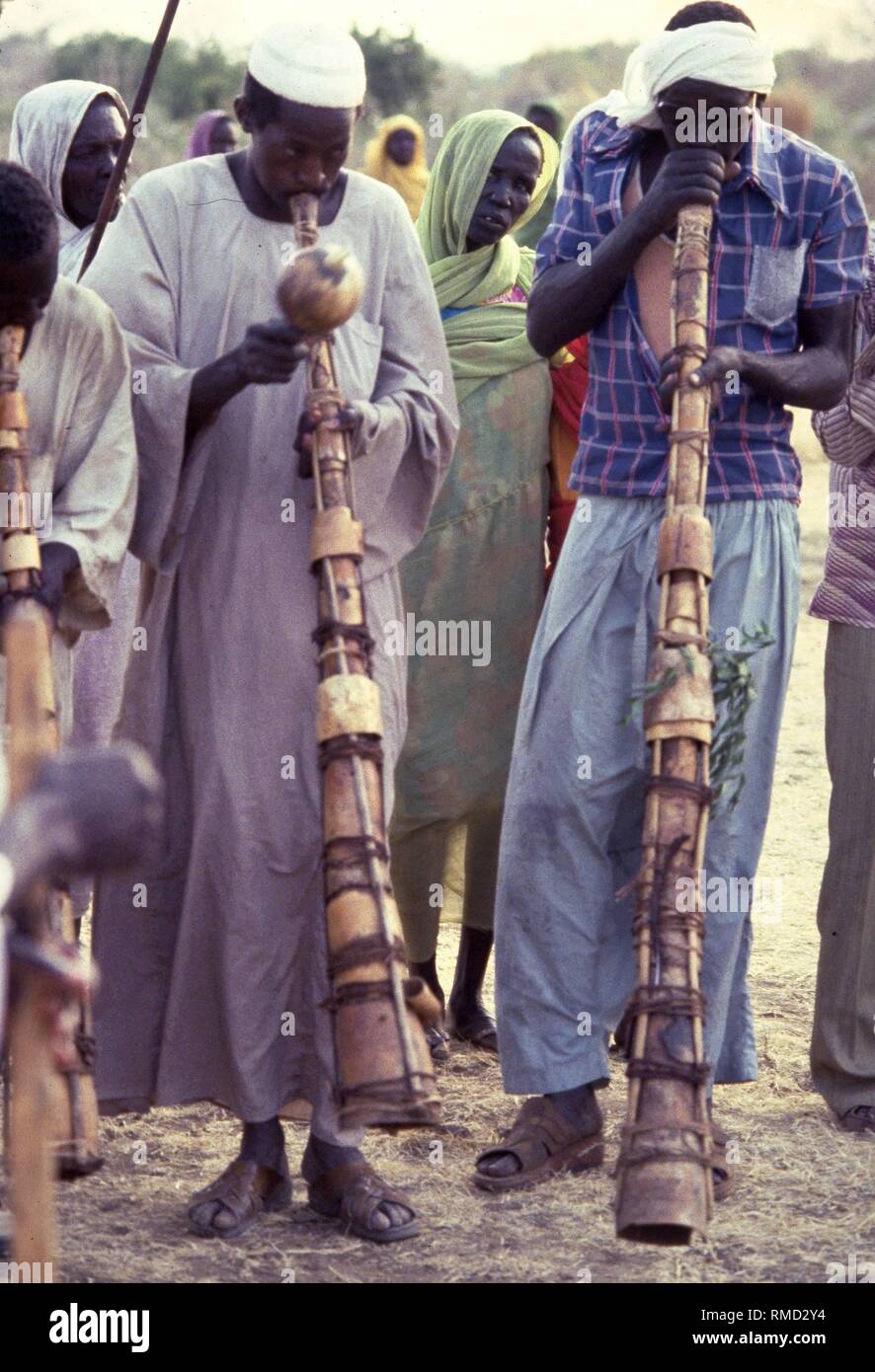 Sudanese musicians with wind instruments Stock Photo - Alamy