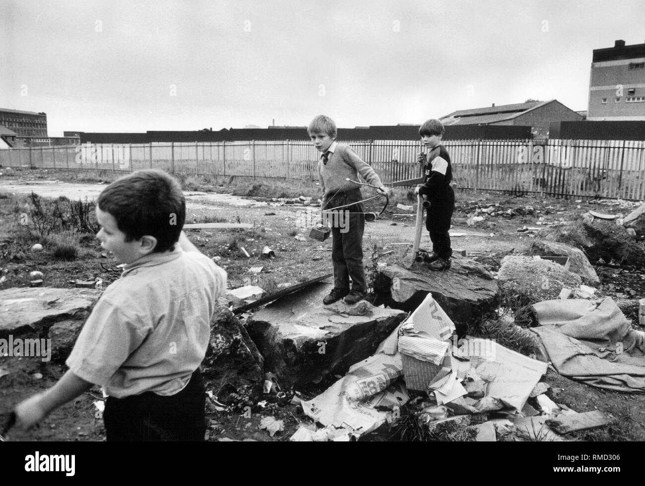 Children playing at the so-called "Peace Line", which runs two and a ...