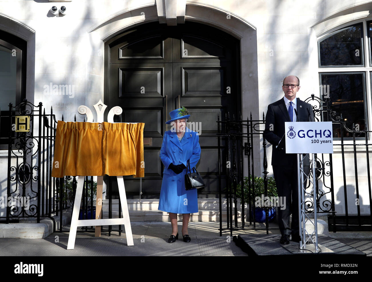 Queen Elizabeth II listens to GCHQ Director Jeremy Fleming during a ...