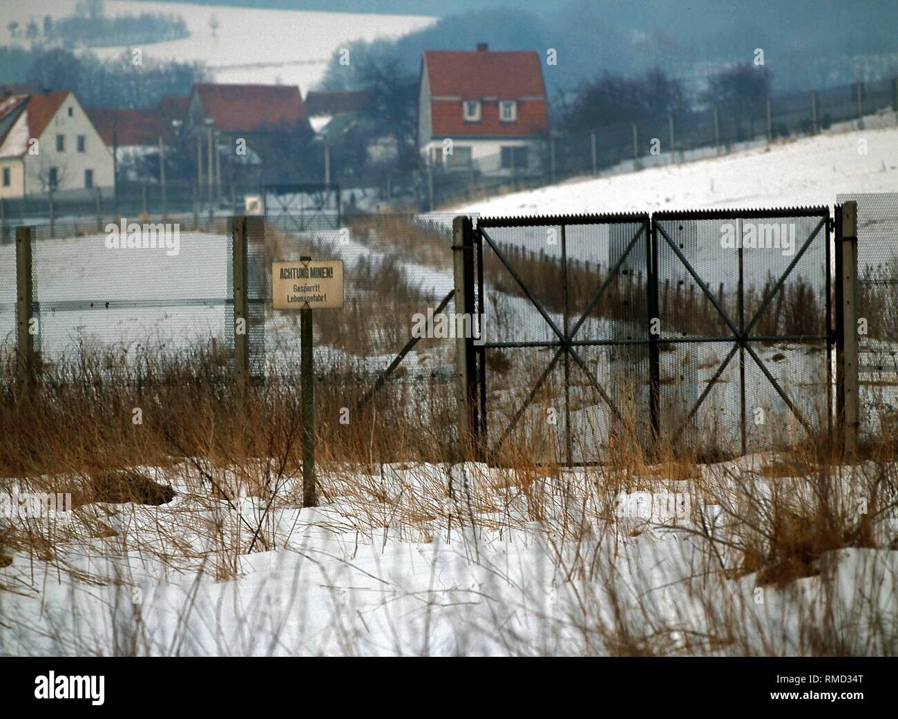 The municipality of Melpers in the GDR, beyond the fence, at the inner ...