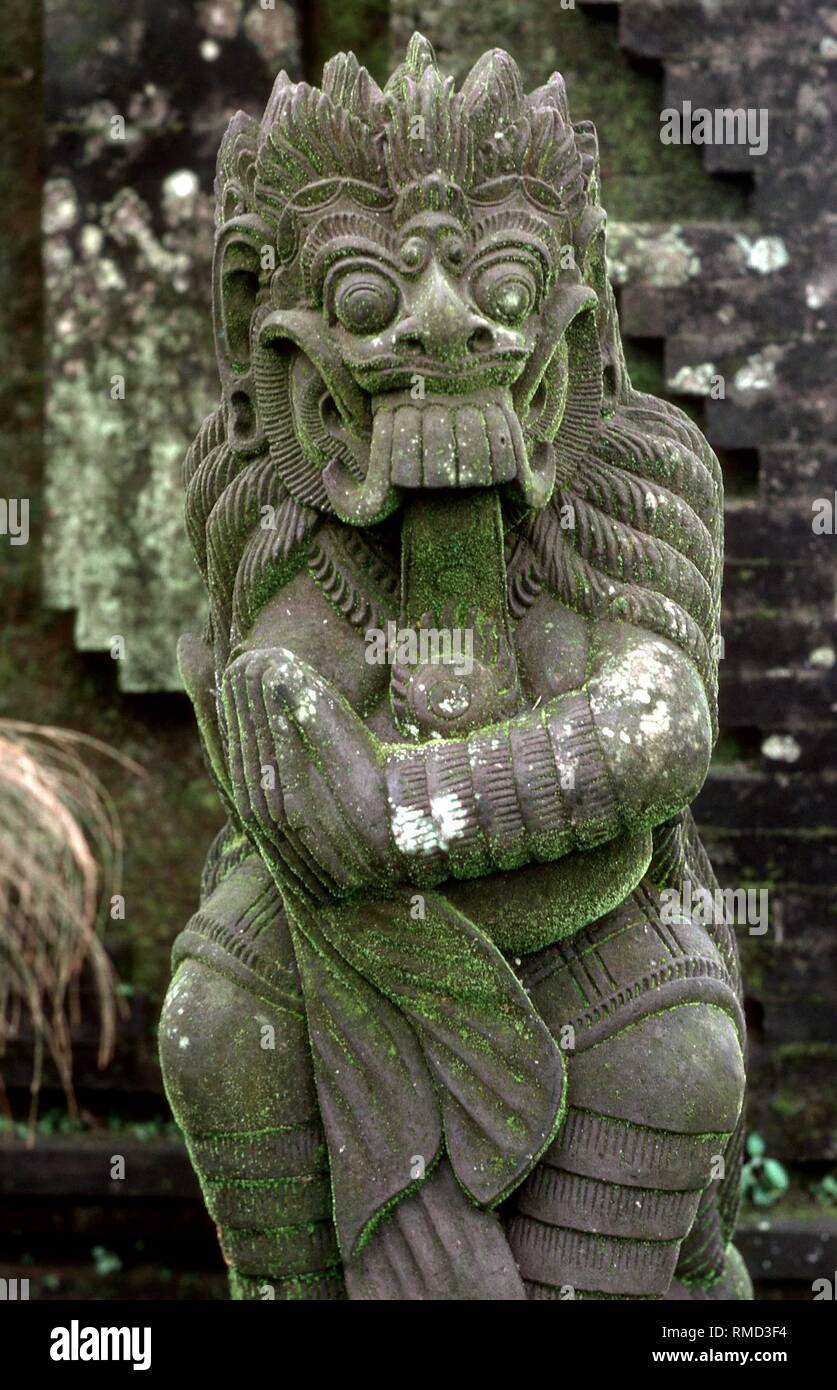 Statue of a demon in the Besakih Temple, which has the function of a ...