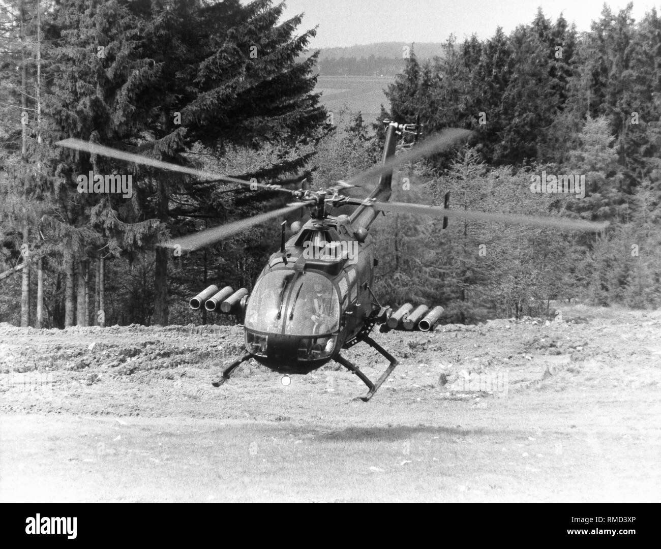The helicopter Boelkoew Blohm Bo 105, armed with HOT antitank missiles ...