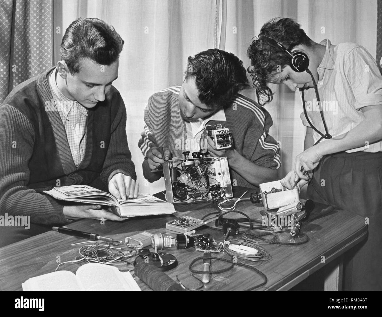 Boy electrical work Black and White Stock Photos & Images - Alamy