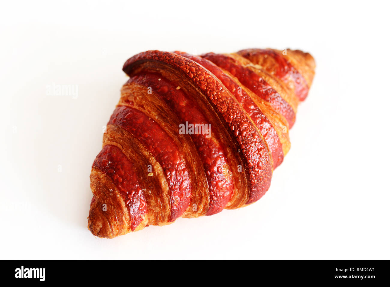 fresh baked red croissant Stock Photo - Alamy