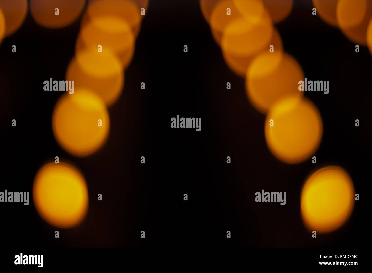 Lines formed by blurred lights of golden colors. Resource for designers ...