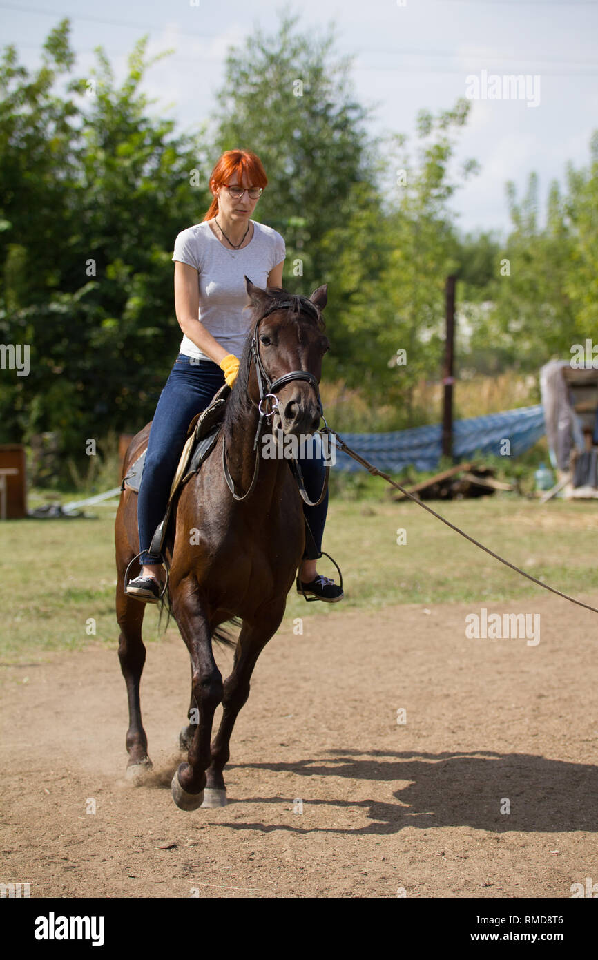 Woman brown hair running field hi-res stock photography and images - Alamy