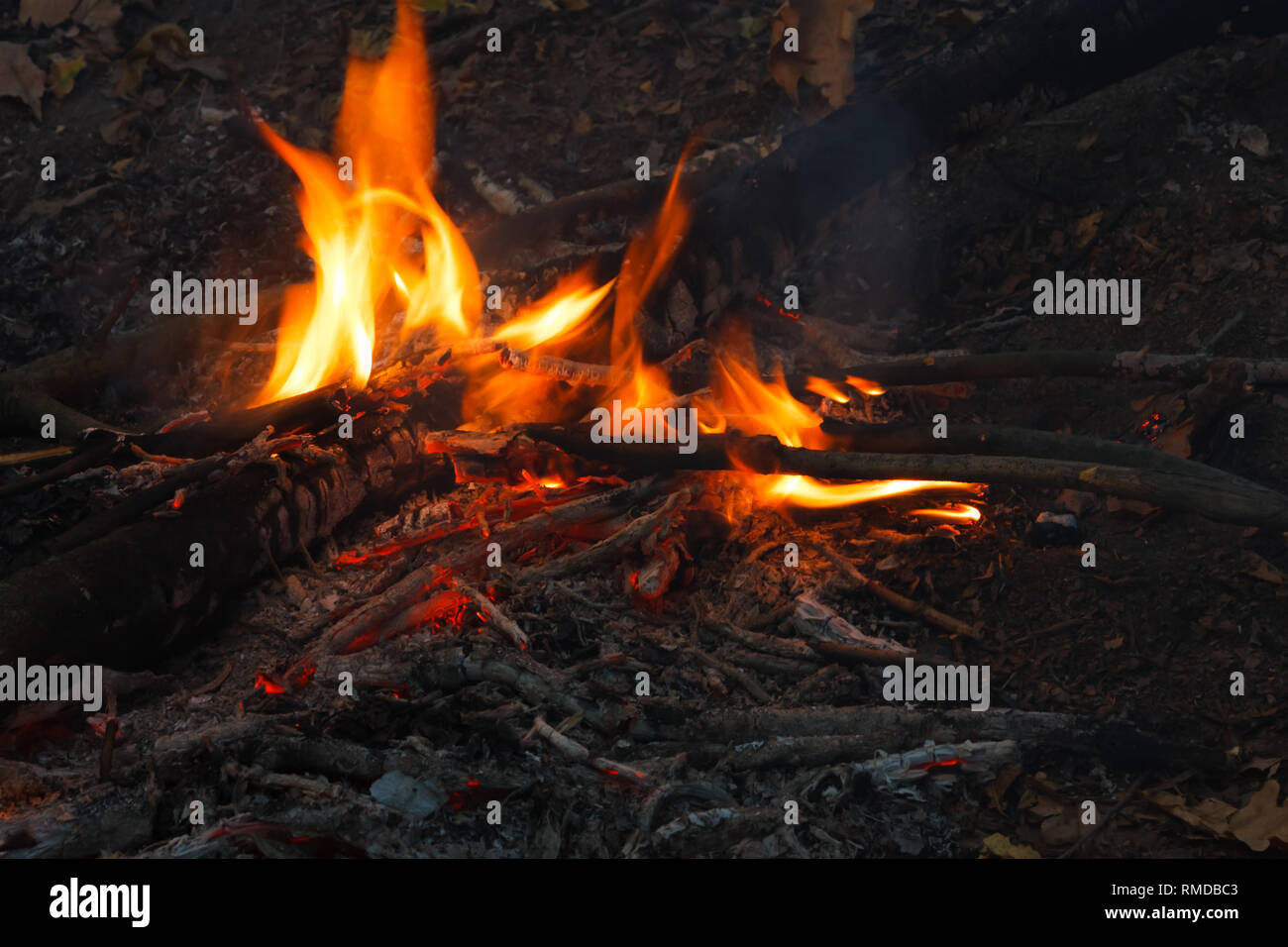 Landscape with night bonfire background Stock Photo - Alamy