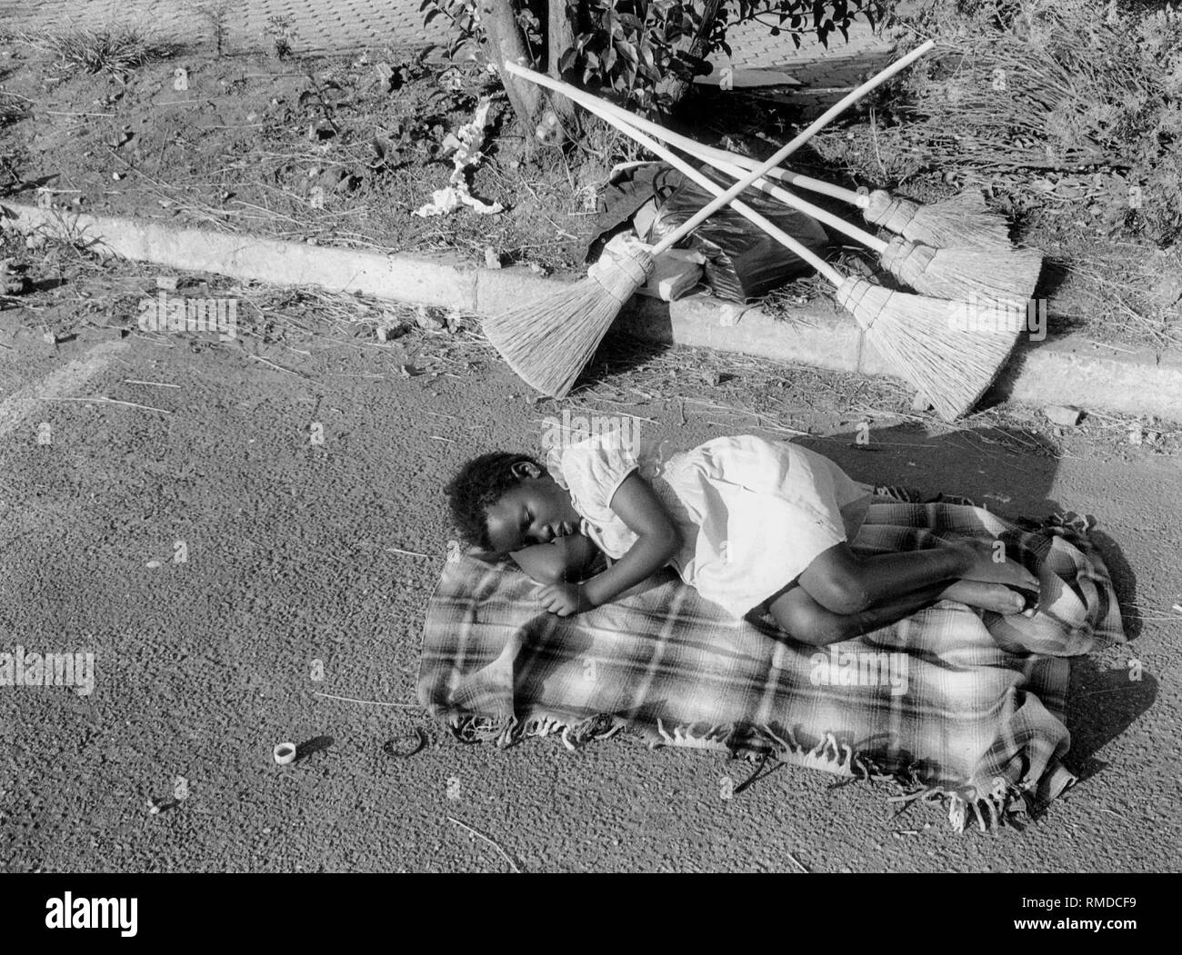 Sleeping street child africa hi-res stock photography and images - Alamy