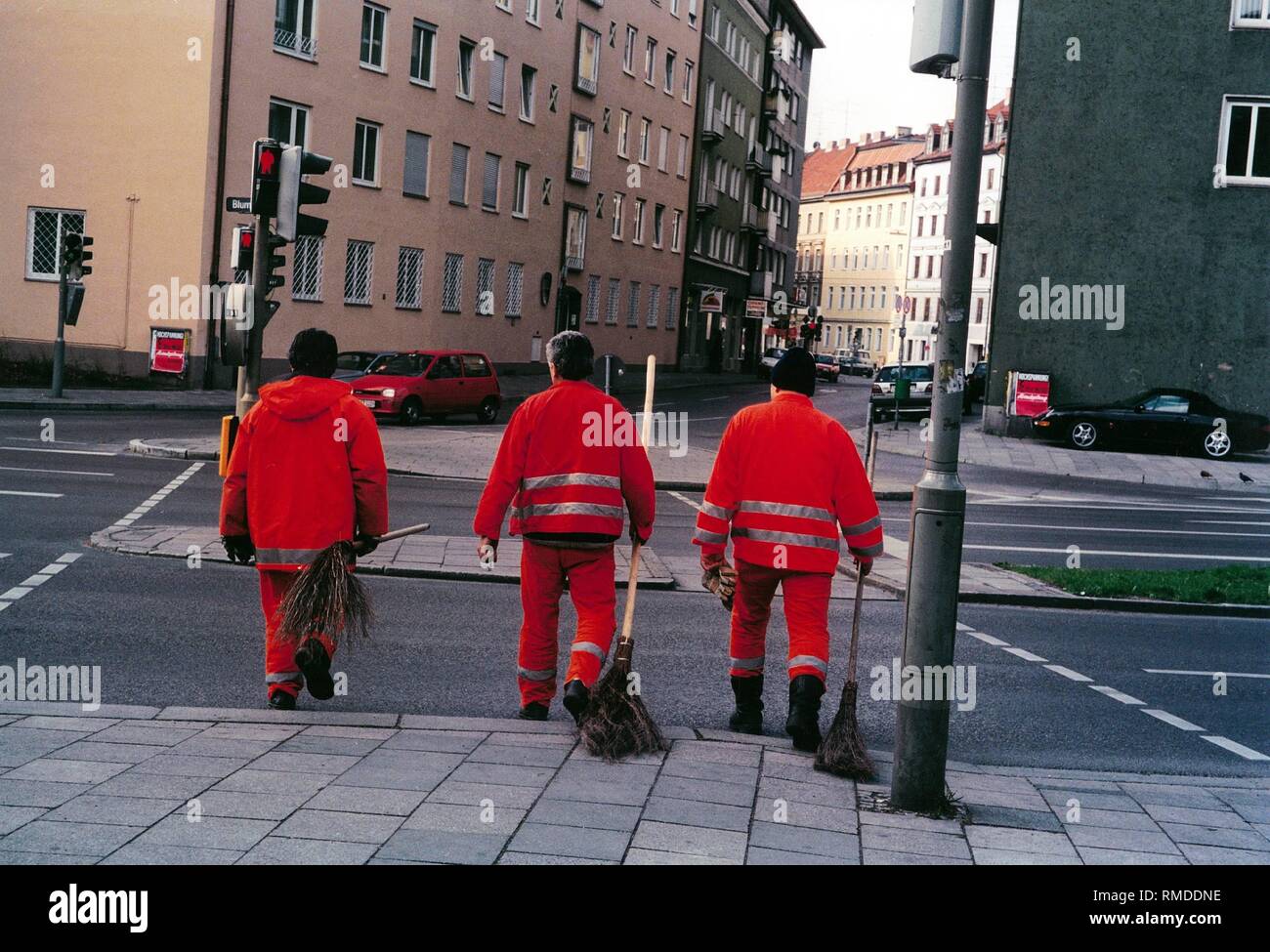 Three street sweepers at work in Munich Stock Photo - Alamy