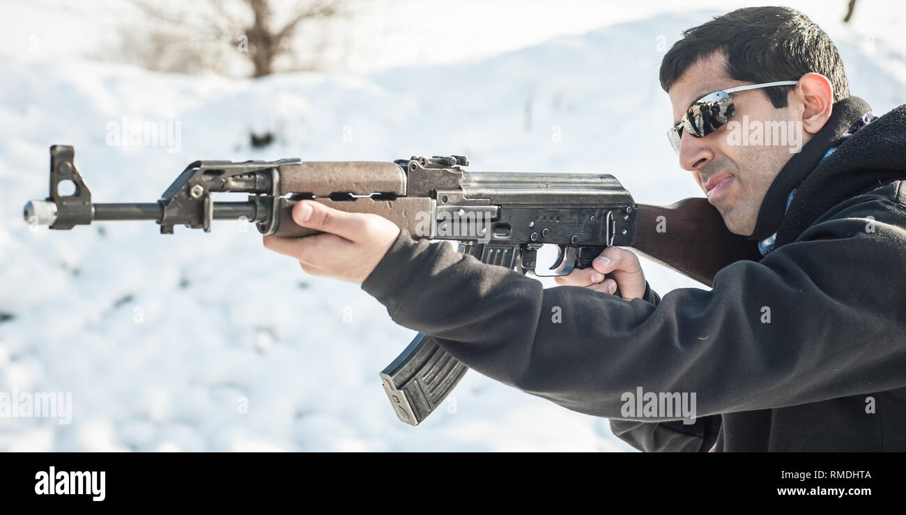 Front view gun point of riffle machine gun. Firearm shooting and ...