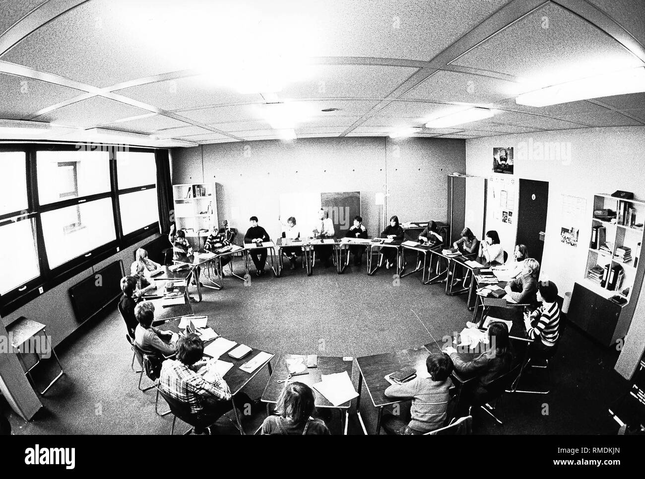 Teachers and students of a Cologne Comprehensive School sit in a circle ...