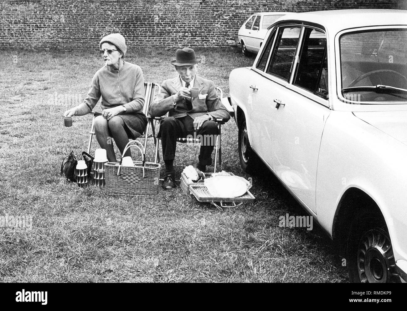 A British couple drinking tea outdoors Stock Photo - Alamy