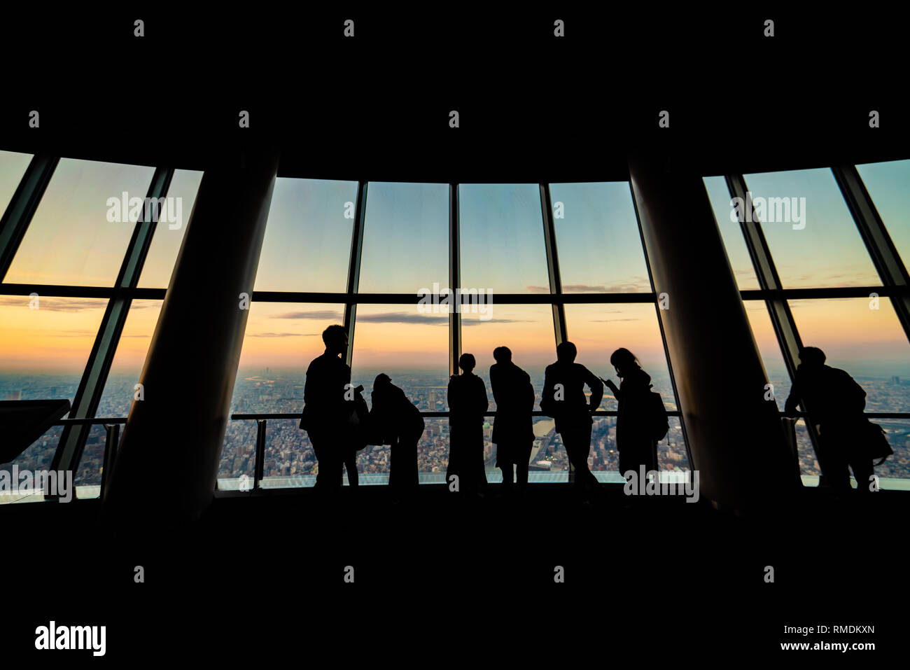sunset views, tourists at Tembo Deck observation deck. The Tokyo ...