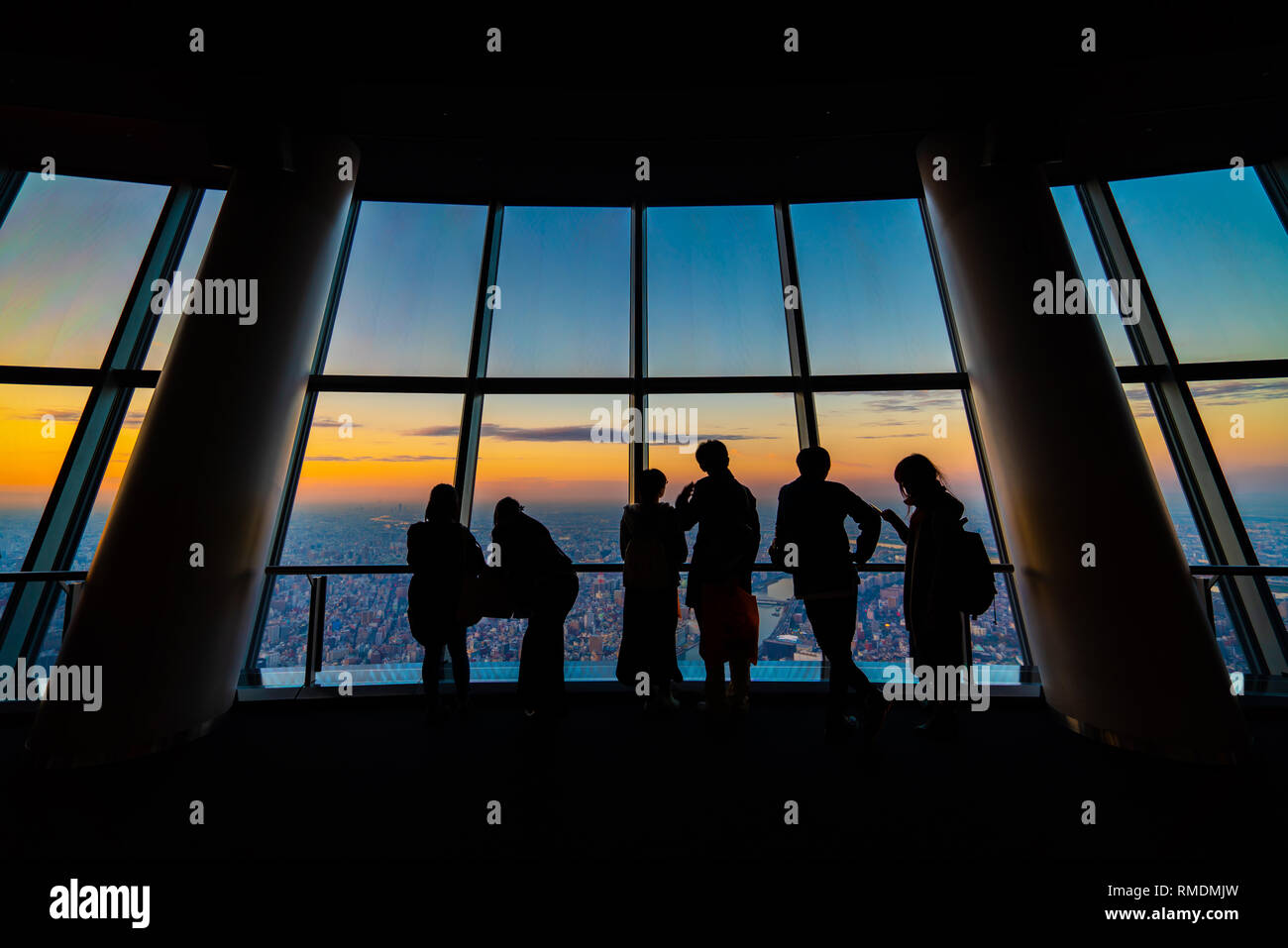 sunset views, tourists at Tembo Deck observation deck. The Tokyo ...