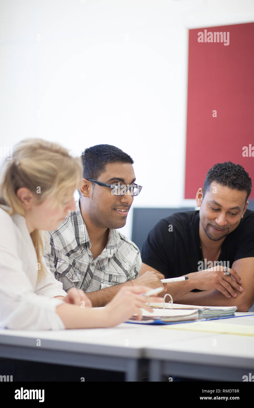 In classroom multicultural adult learners hi-res stock photography and ...
