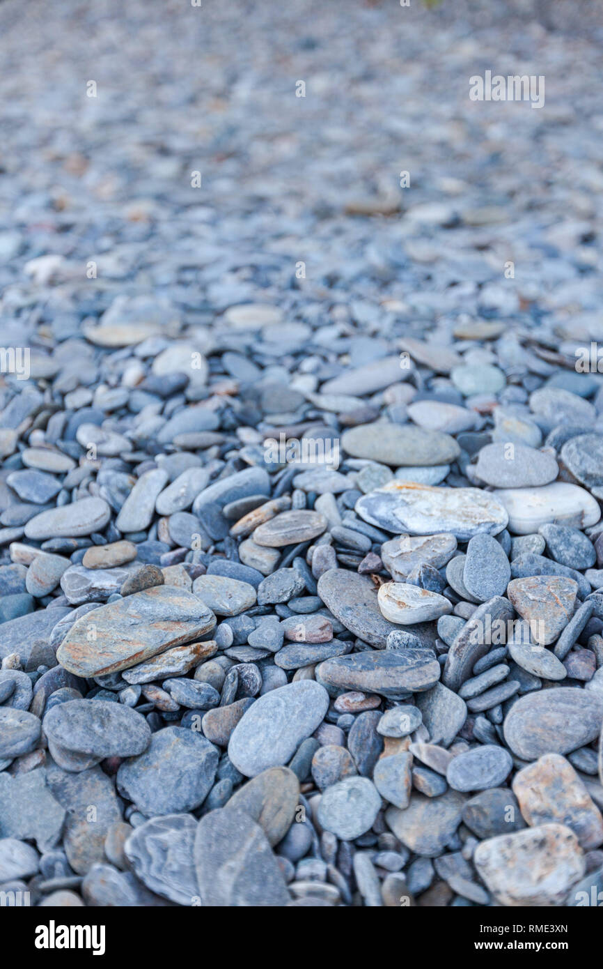 Round rocks on a beach Stock Photo - Alamy