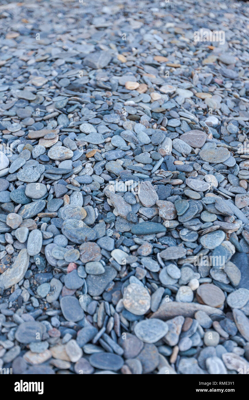 Round rocks on a beach Stock Photo - Alamy