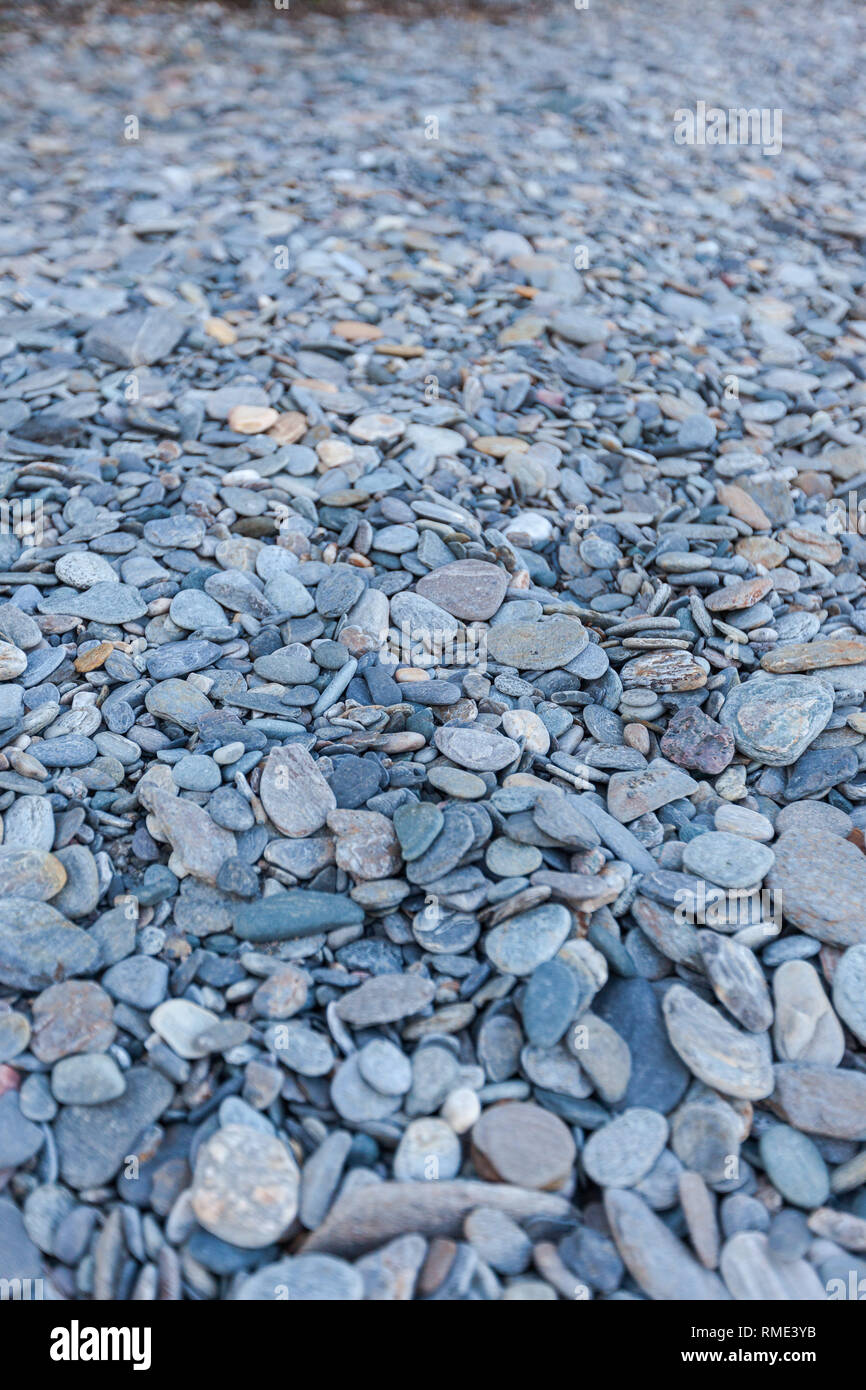 Round rocks on a beach Stock Photo - Alamy