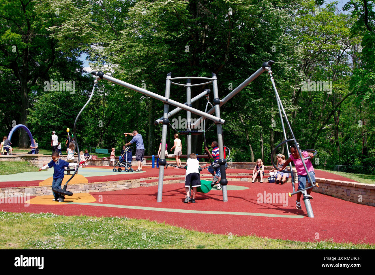 playground scene, kids, enjoying, large equipment; fun; different races ...