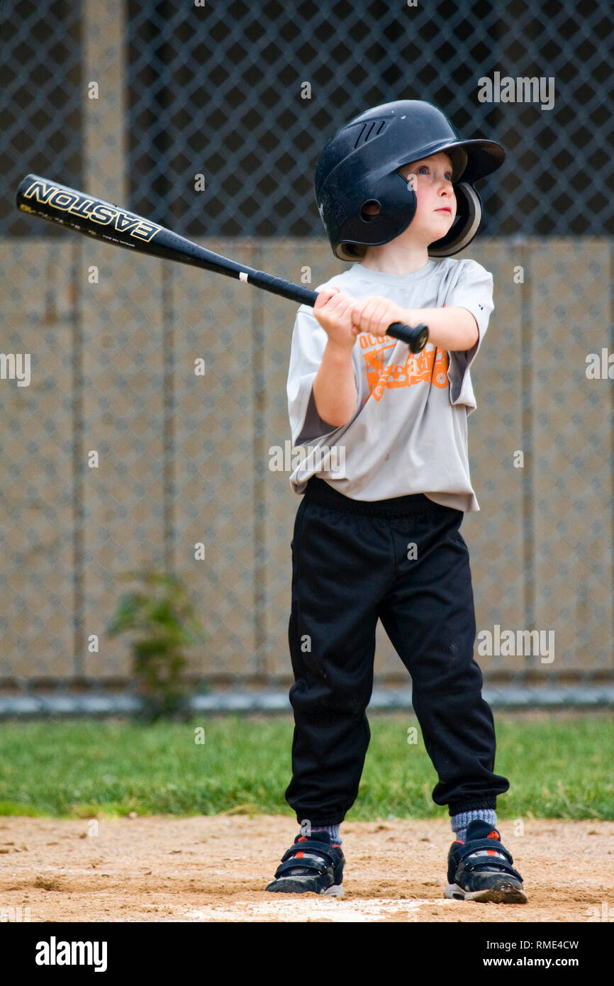 Cute Little Boy Playing Baseball