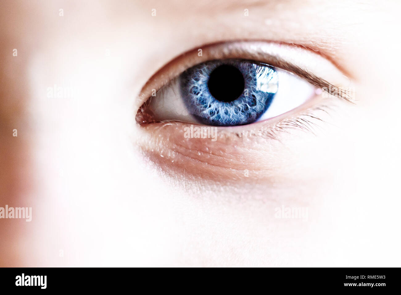 Macro Child Blue Eye Stock Photo - Alamy