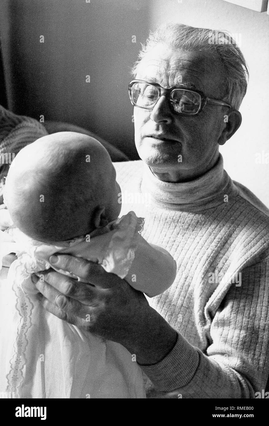 Old man grandchild Black and White Stock Photos & Images - Alamy