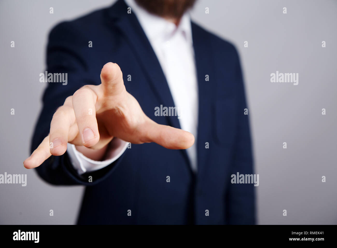 Man showing sign with hand Stock Photo - Alamy