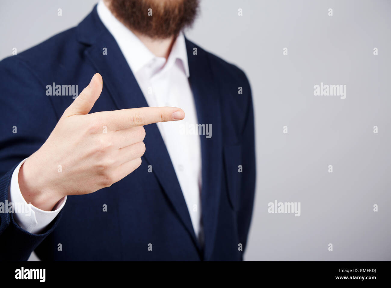 Worker at grey studio background Stock Photo - Alamy