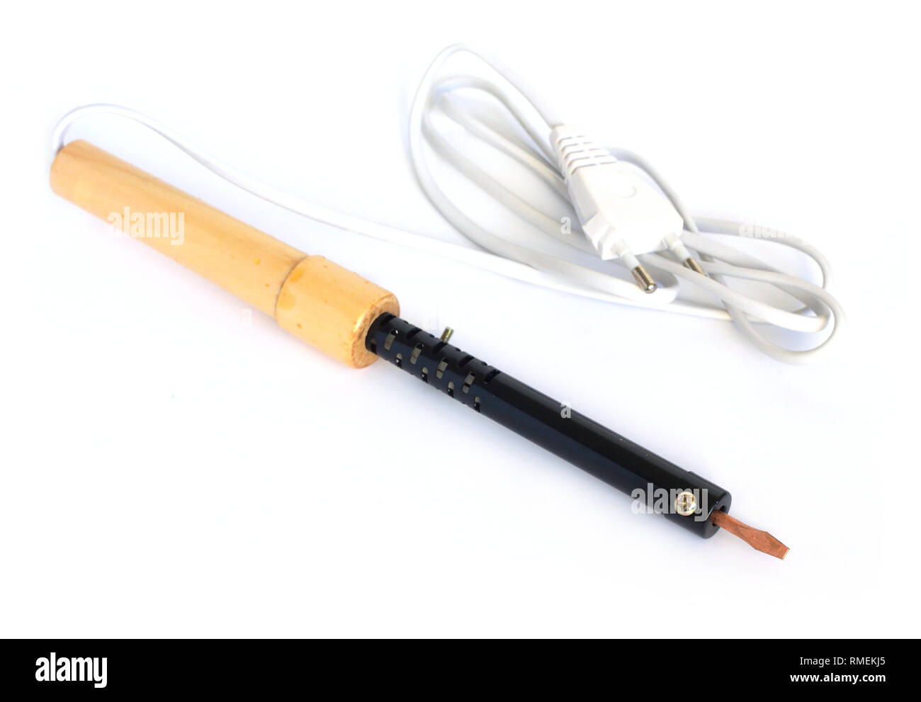 Electric soldering iron with a wooden handle and a white wire with a ...