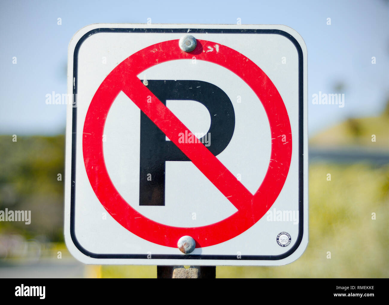 Weathered No Parking Sign Stock Photo - Alamy