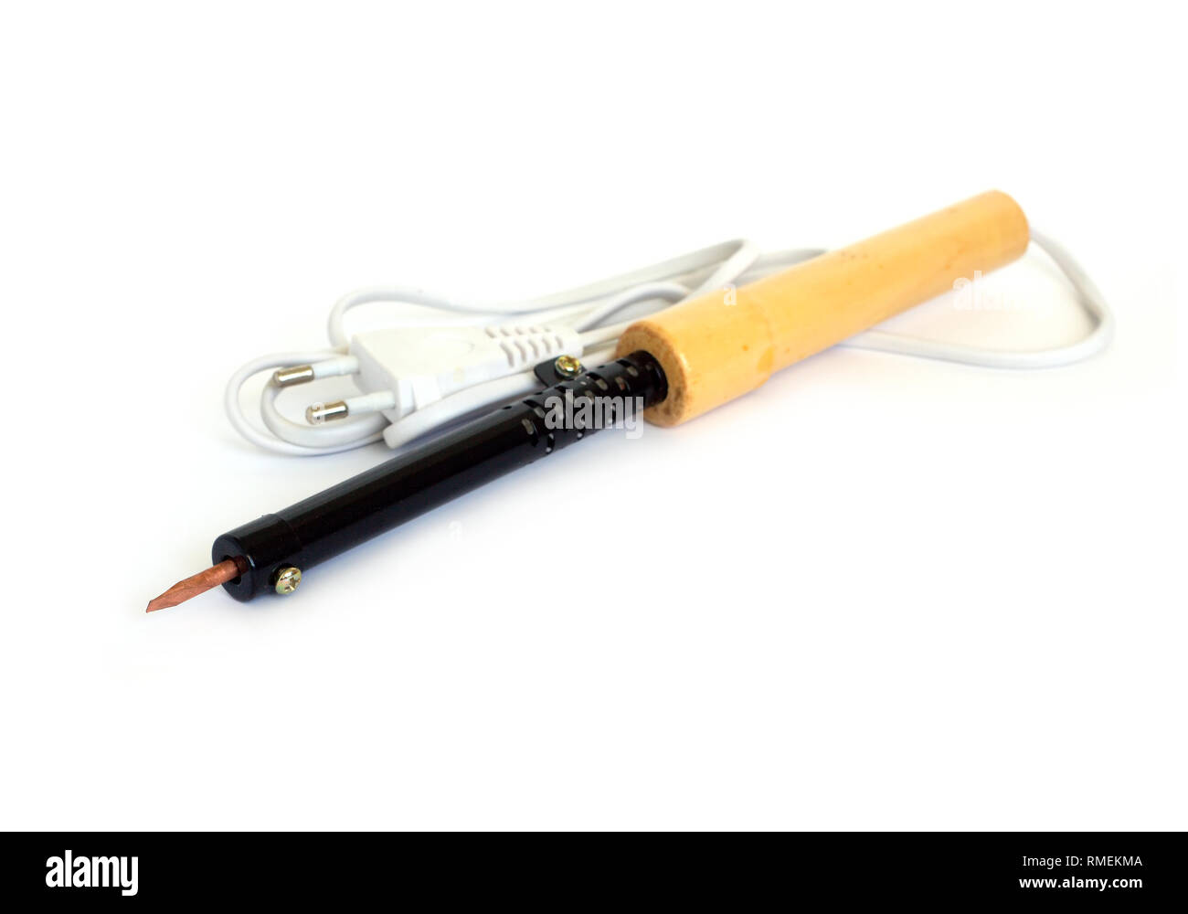 Electric soldering iron with a wooden handle and a white wire with a ...