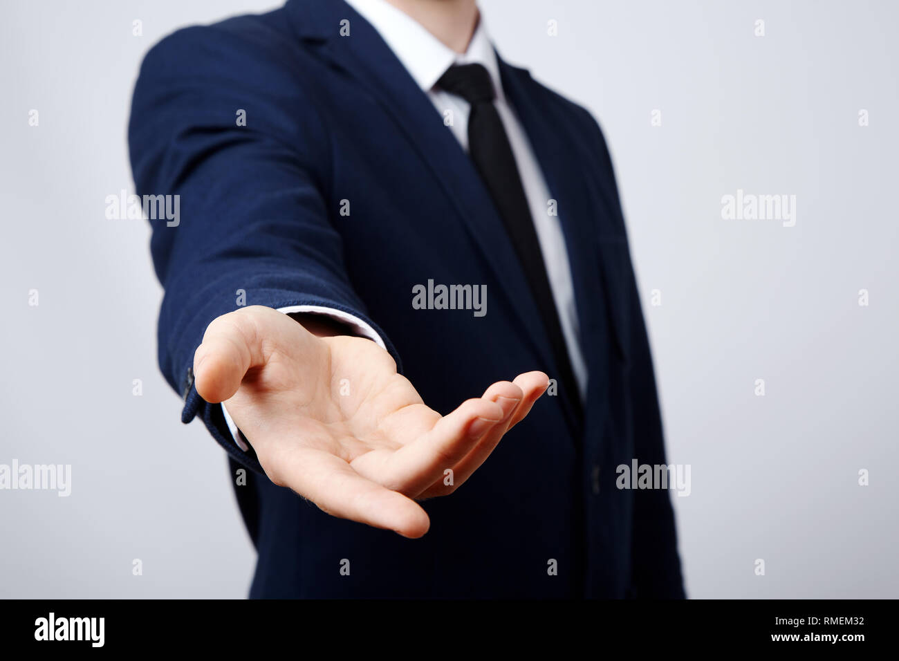 Worker at grey studio background Stock Photo - Alamy