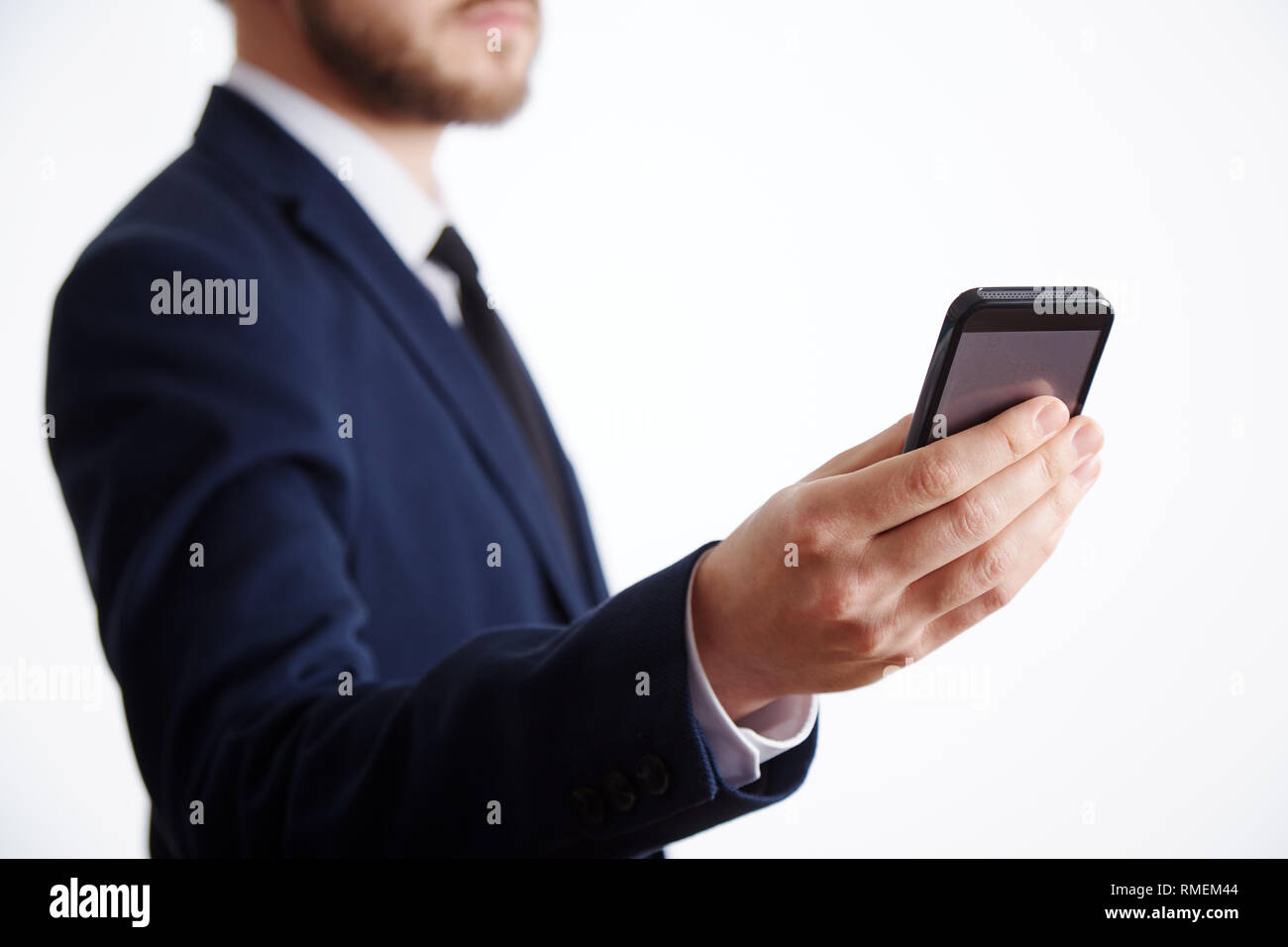 Worker at grey studio background Stock Photo - Alamy
