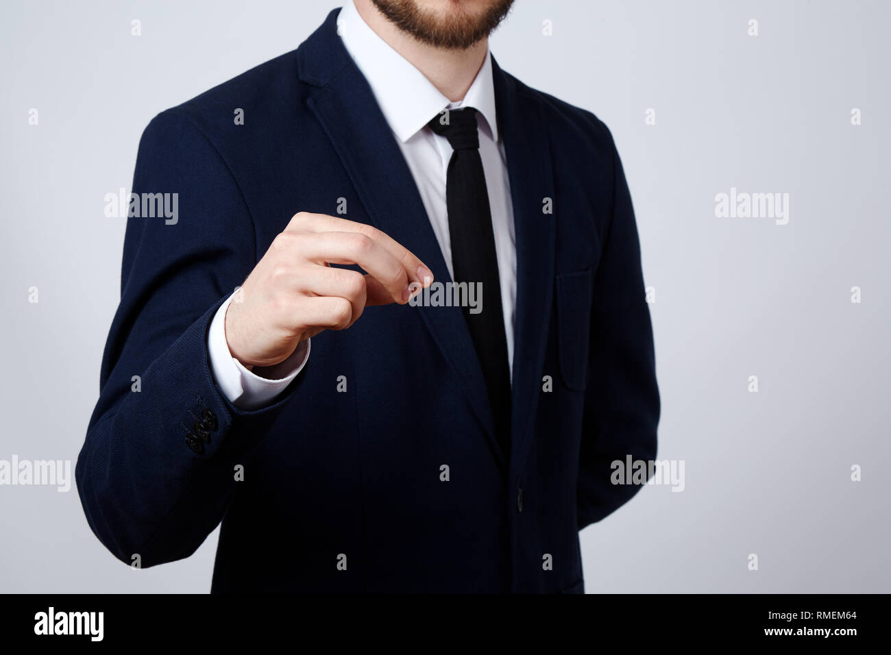 Worker at grey studio background Stock Photo - Alamy