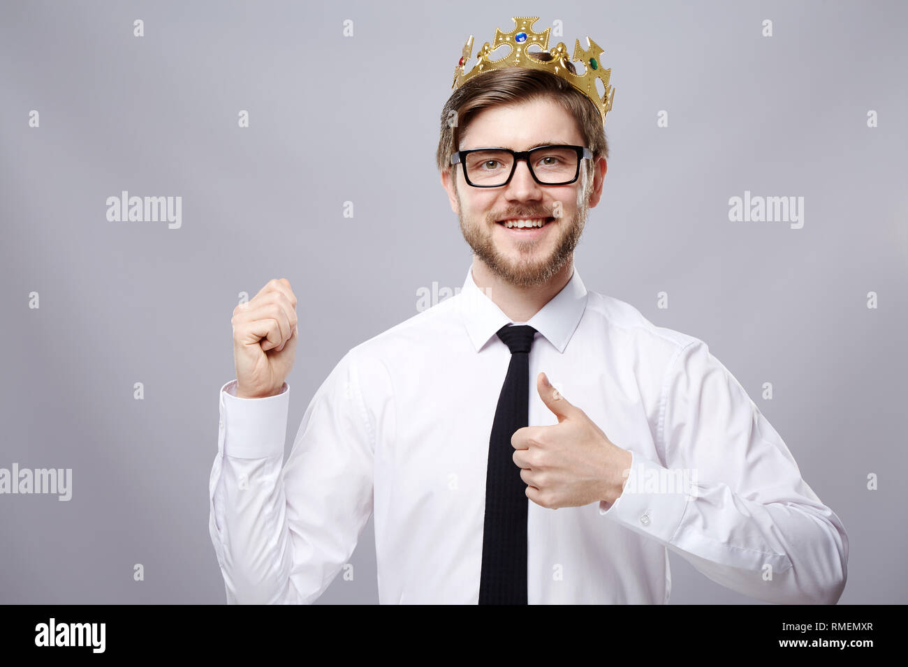 Worker at grey studio background Stock Photo - Alamy