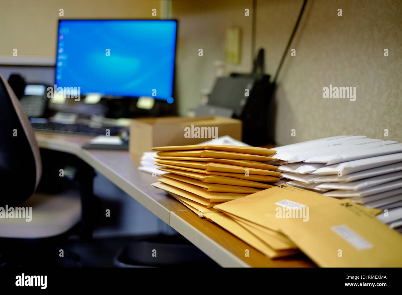 Envelopes on desk business office communication Stock Photo - Alamy