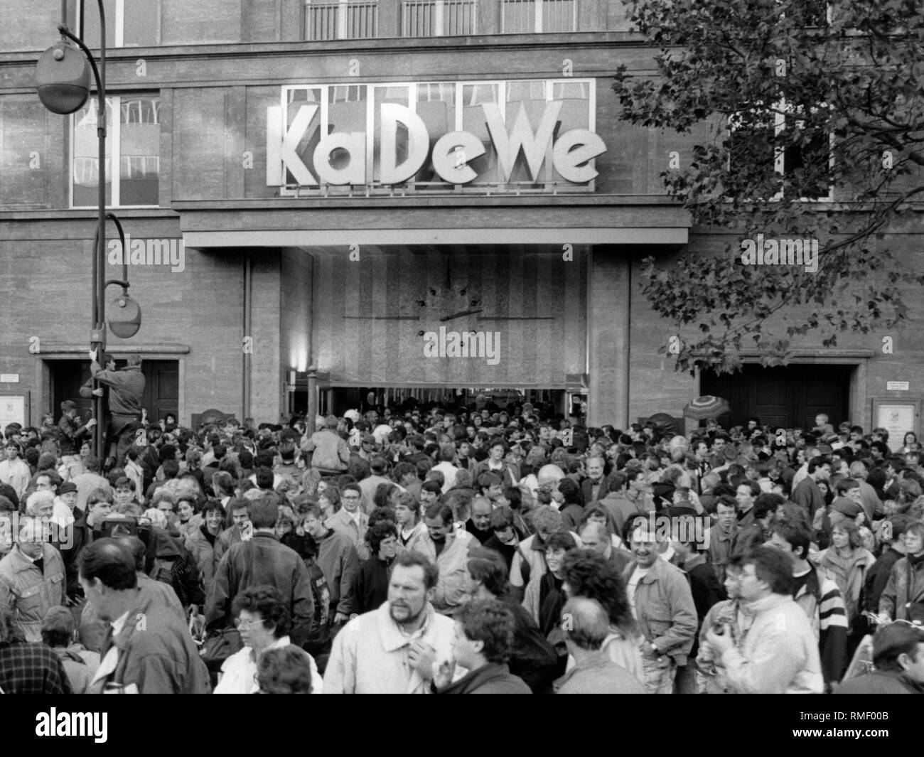 After the fall of the Berlin Wall, numerous East Berliners visit West ...
